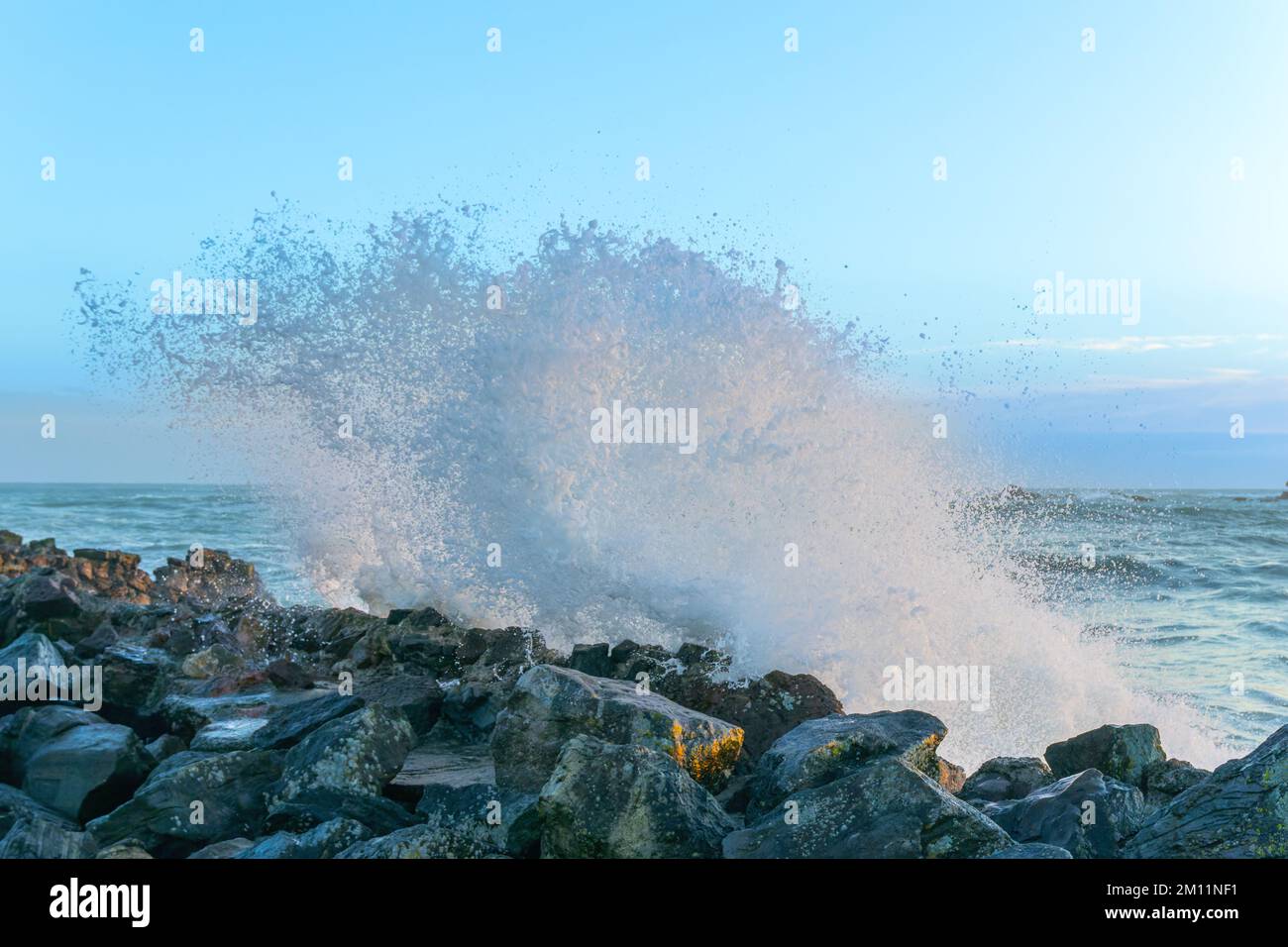 Surging waves of Cyclone Cody crash into rocky foreshore splashing ...