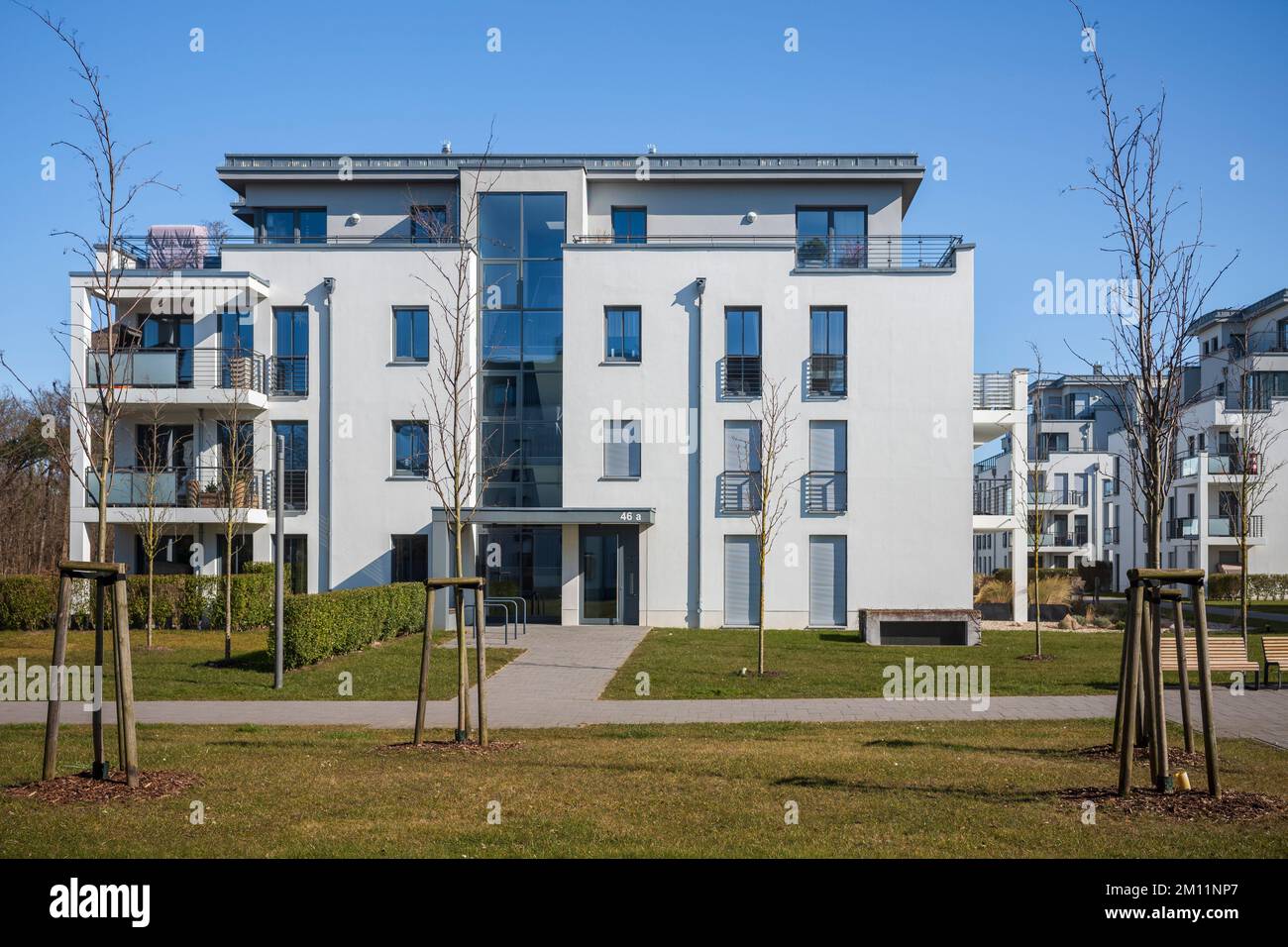 Modern housing complexes in spring daytime in a city. Real estate in ...