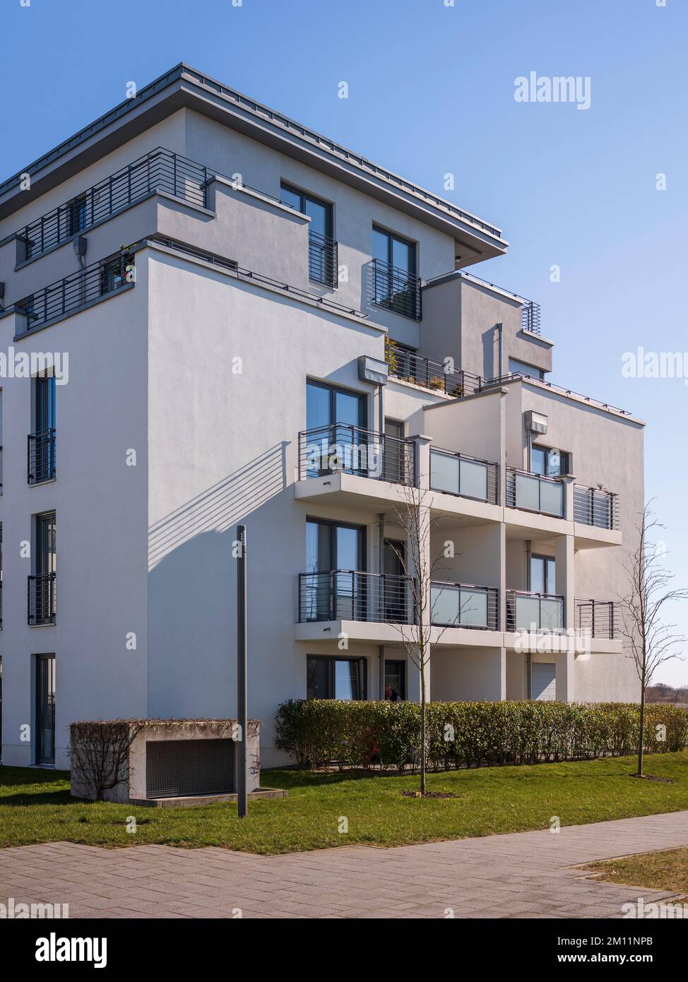 Modern housing complexes in spring daytime in a city. Real estate in ...