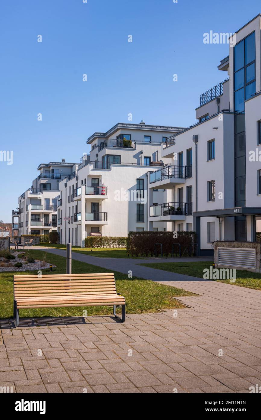 Modern housing complexes in spring daytime in a city. Real estate in ...
