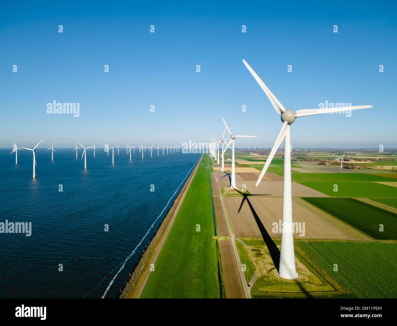 Aerial view at Windmill park with wind mill turbines generating ...