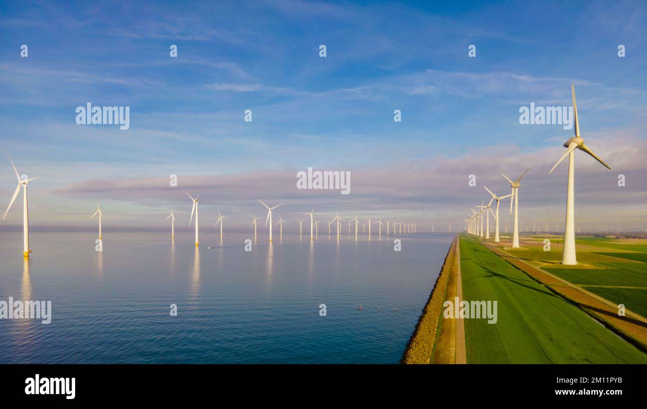 Aerial view at Windmill park with wind mill turbines generating ...