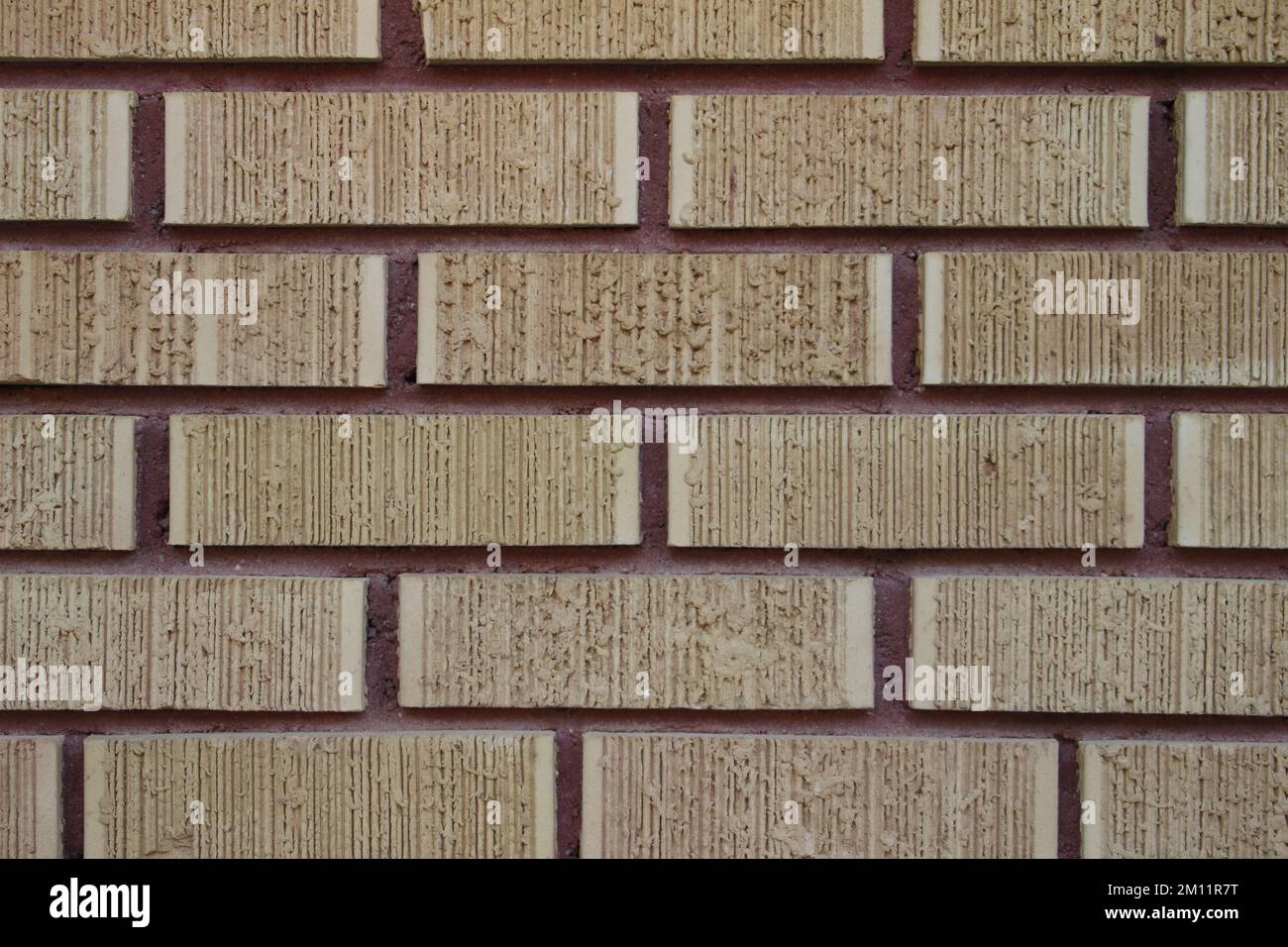 A closeup of fake brick wall background Stock Photo - Alamy