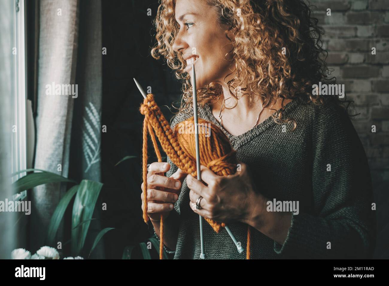 Portrait lady knitting work hi-res stock photography and images - Alamy