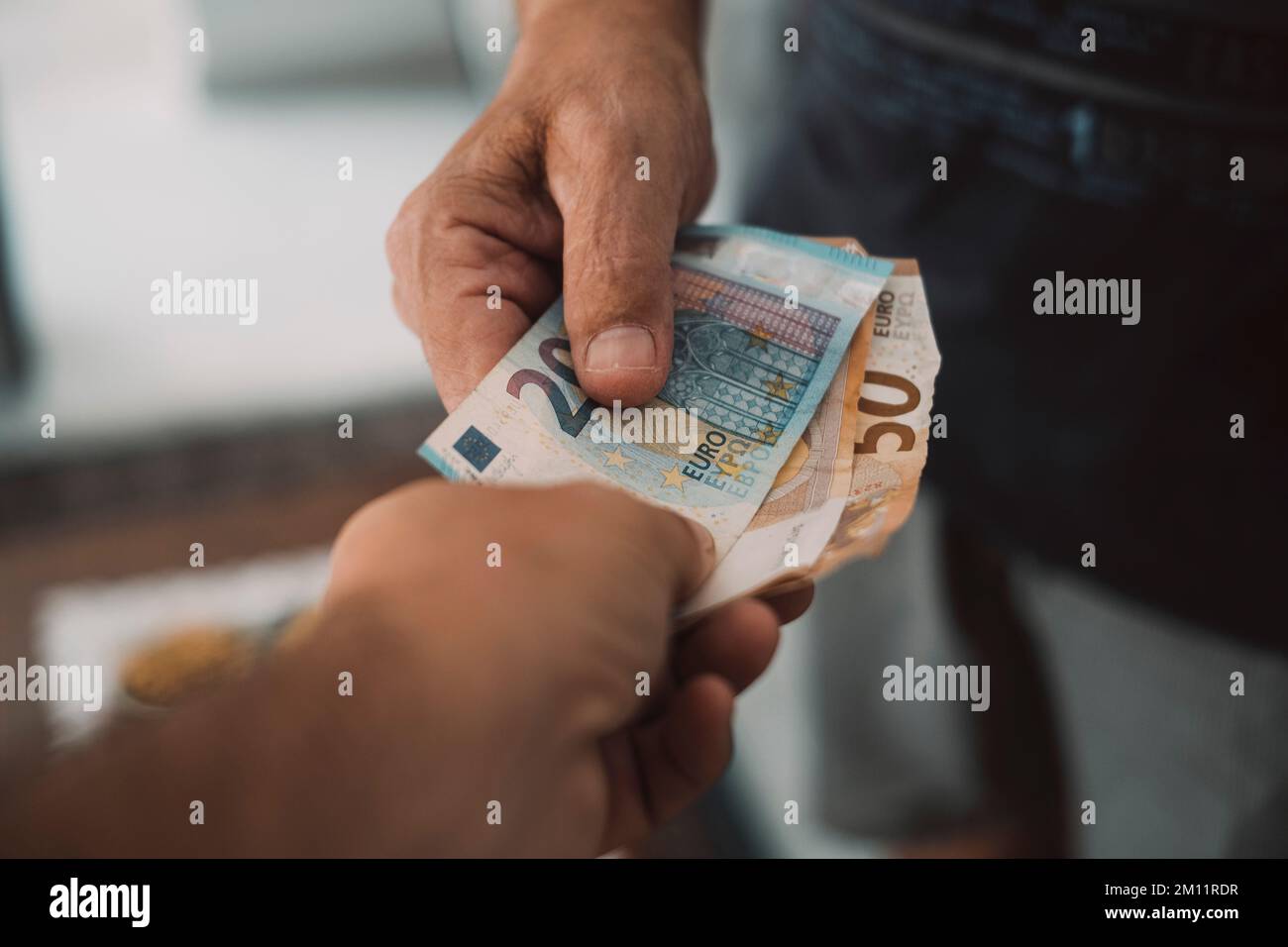 Close up of people exchanging cash banknote money. Concept of giving ...