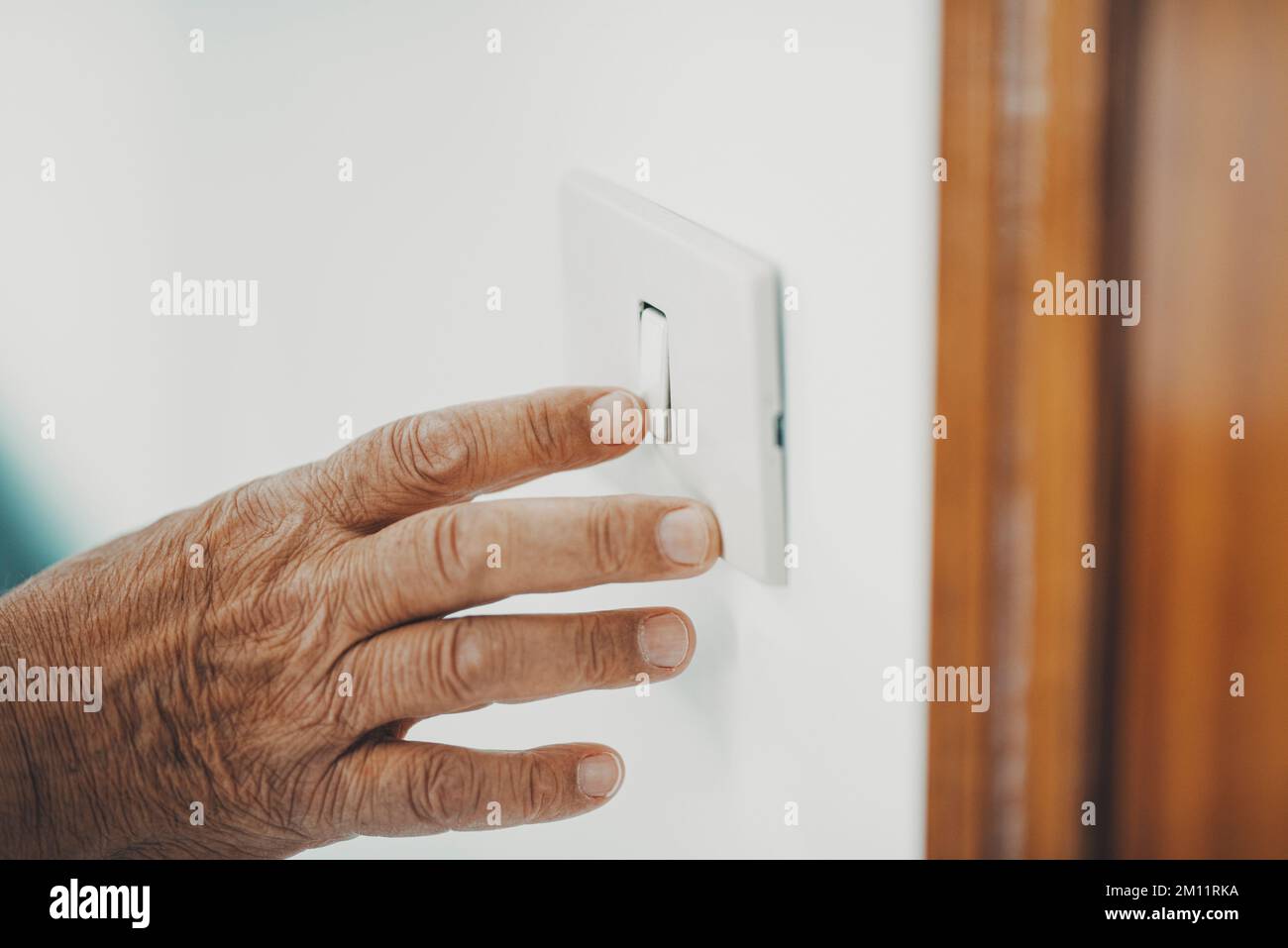 Hand switching on off light hi-res stock photography and images - Alamy