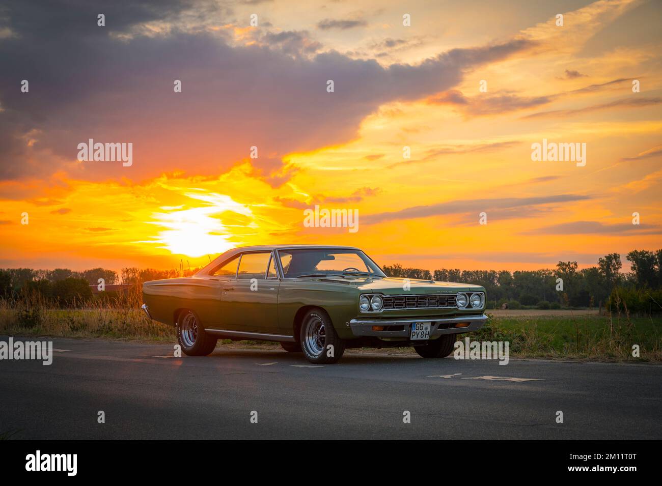 Plymouth Road Runner at sunset, year of construction 1968, muscle car ...