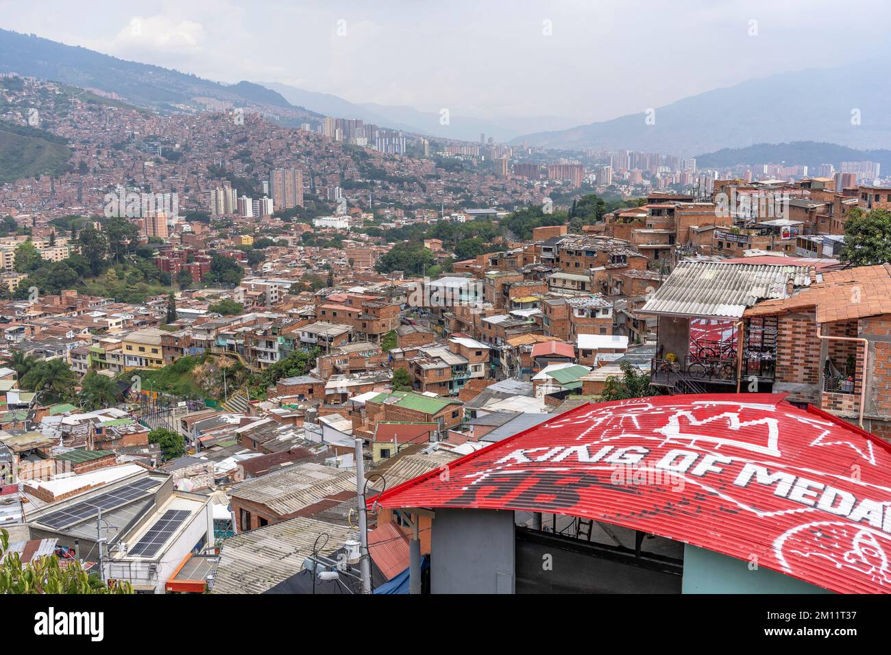 View from the popular neighborhood comuna 13 to medellin hi-res stock ...