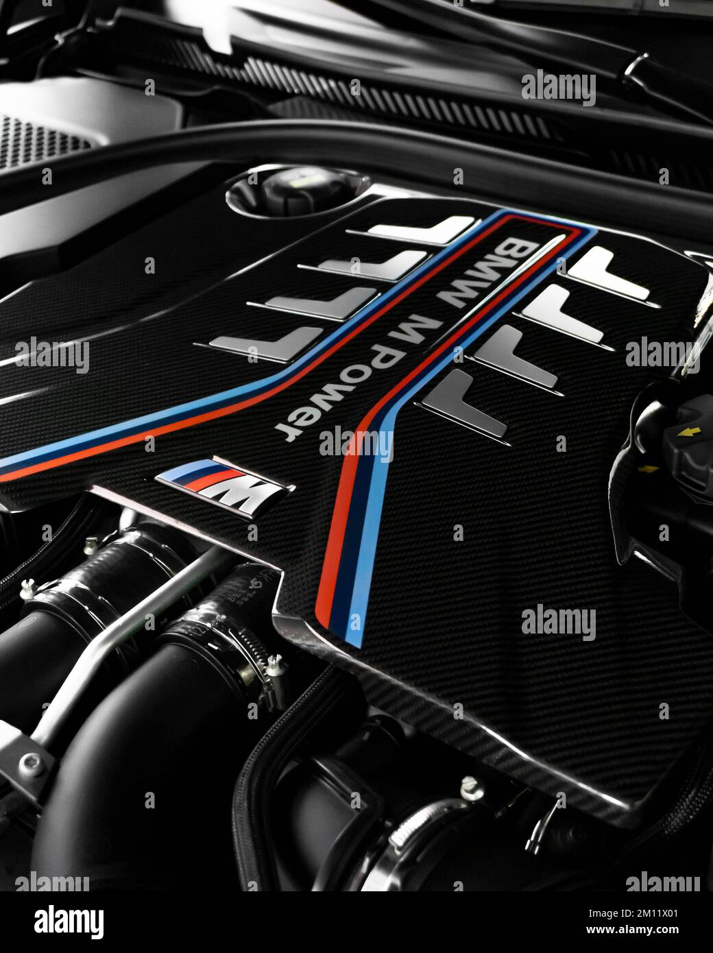A closeup shot of the BMW M5 engine bay Stock Photo - Alamy