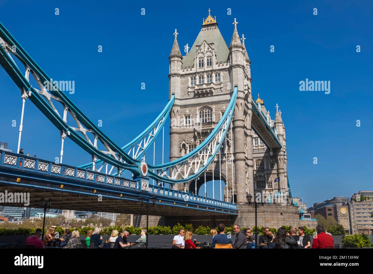 Tower Bridge with Pub Customers Sitting in Foreground, London, England ...