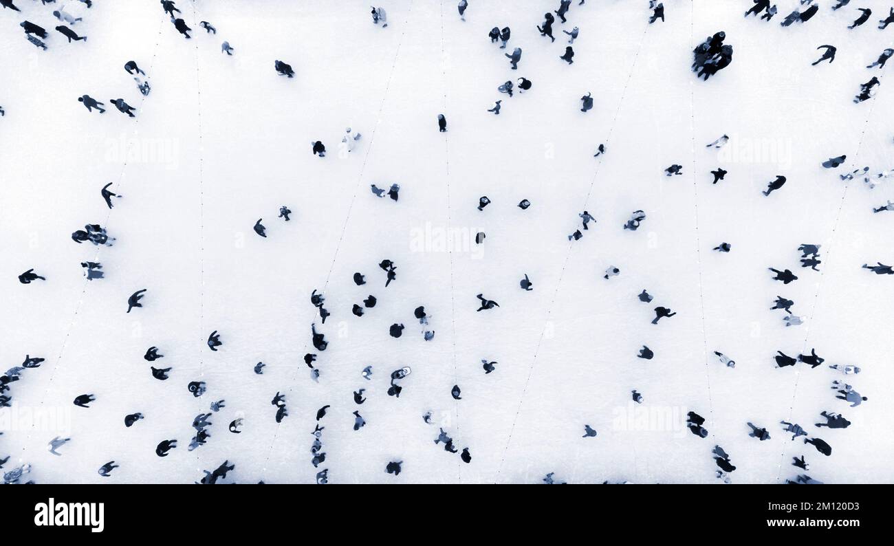 People Skating on an Open-Air Ice Skating Rink. Top view. Many People ... People Skating on an Open-Air Ice Skating Rink. Top view. Many People ...
