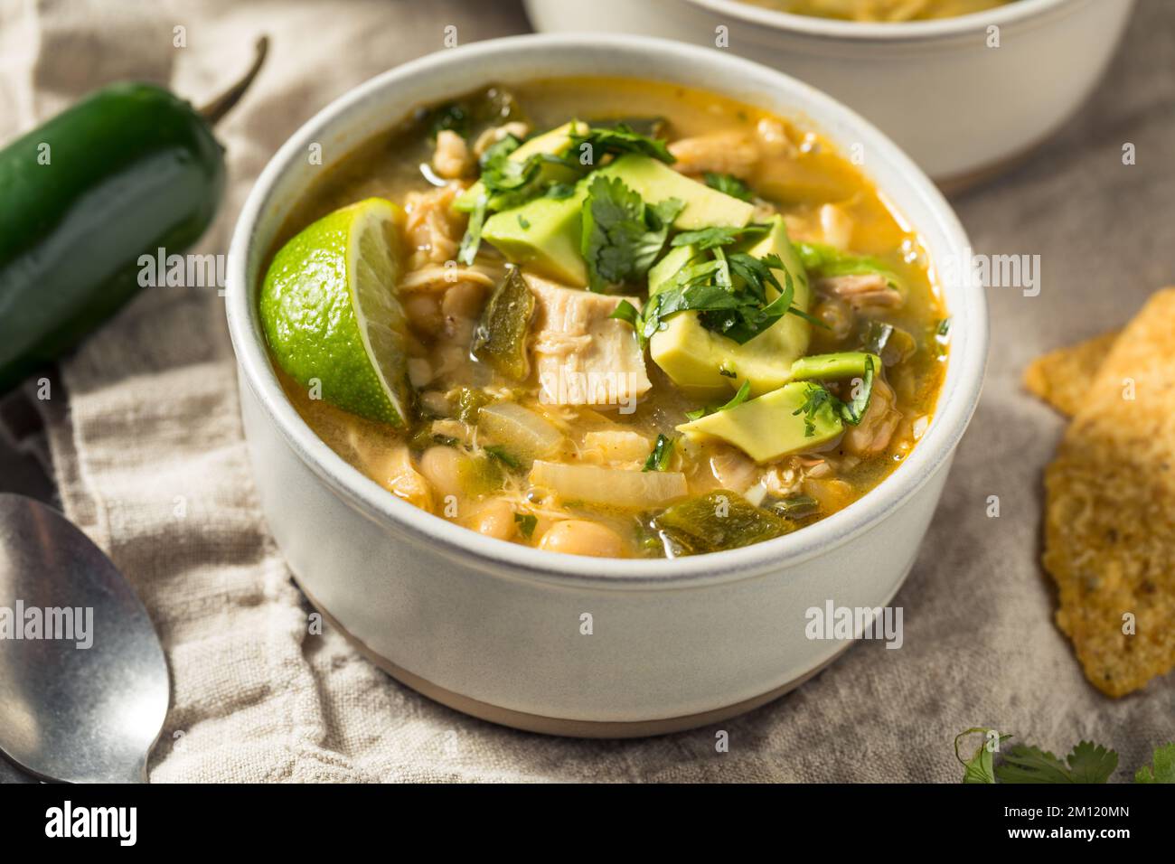 Homemade White Chicken Chili con Carne with Tortilla Chips Stock Photo ...