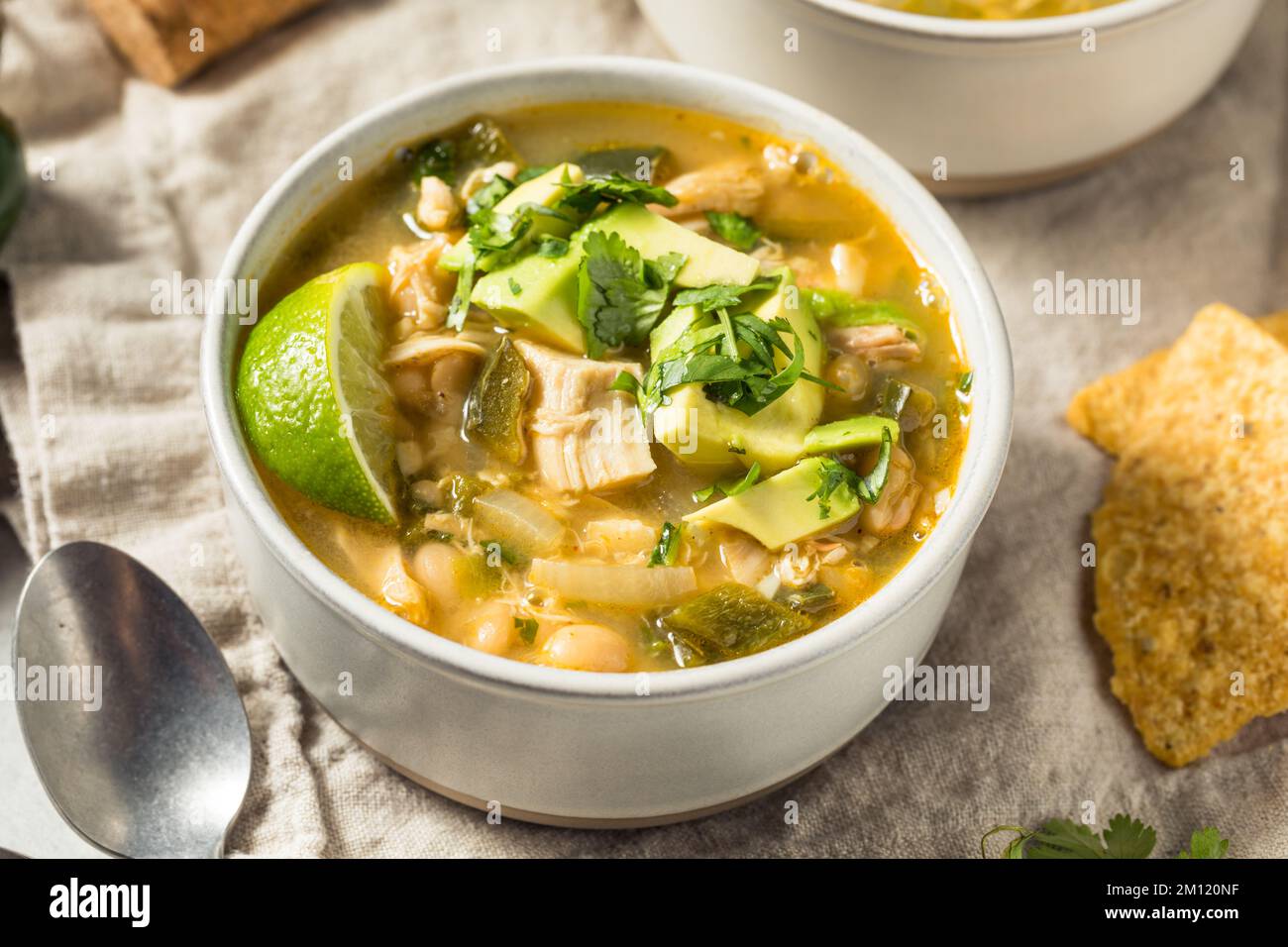 Homemade White Chicken Chili con Carne with Tortilla Chips Stock Photo ...