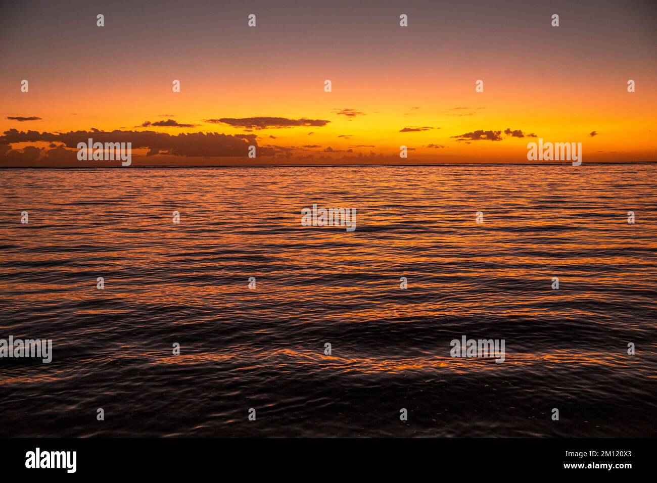 The ocean at sunset at the west coast of mauritius Island, Africa Stock ...