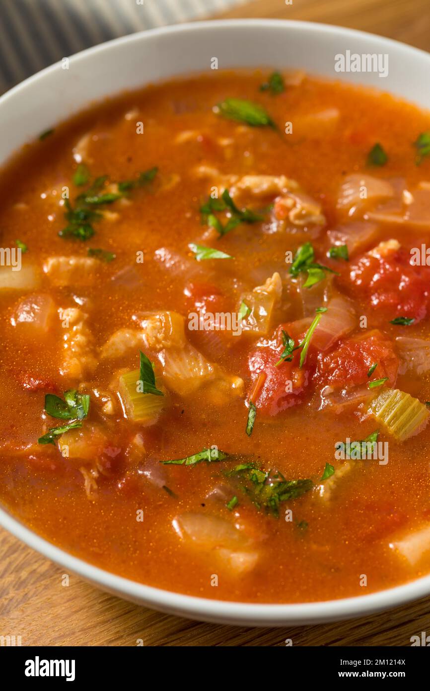 Homemade Manhattan Clam Chowder with Tomato and Parsley Stock Photo - Alamy
