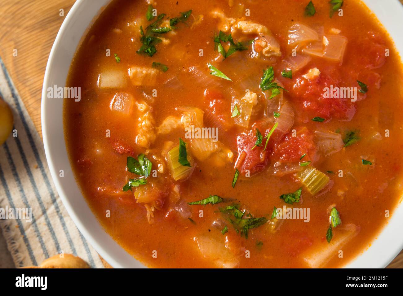Homemade Manhattan Clam Chowder with Tomato and Parsley Stock Photo - Alamy