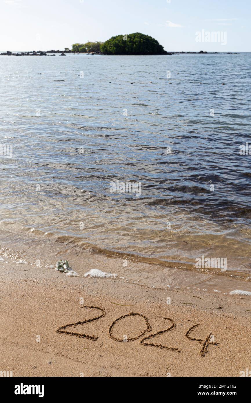 2024 written on a beach in sand hi-res stock photography and images - Alamy