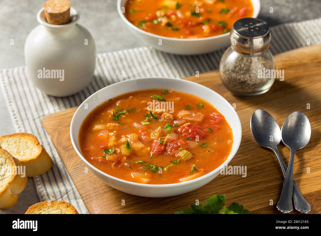 Homemade Manhattan Clam Chowder with Tomato and Parsley Stock Photo - Alamy