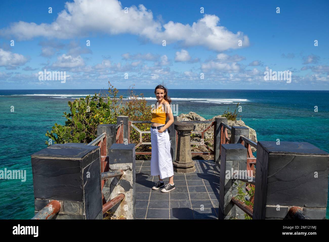 Young lady at Maconde view point. Famous road curve in the south of ...