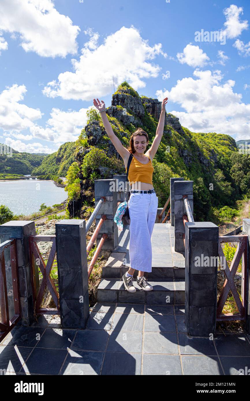 Young lady in front of Maconde view point. Famous road curve in the ...