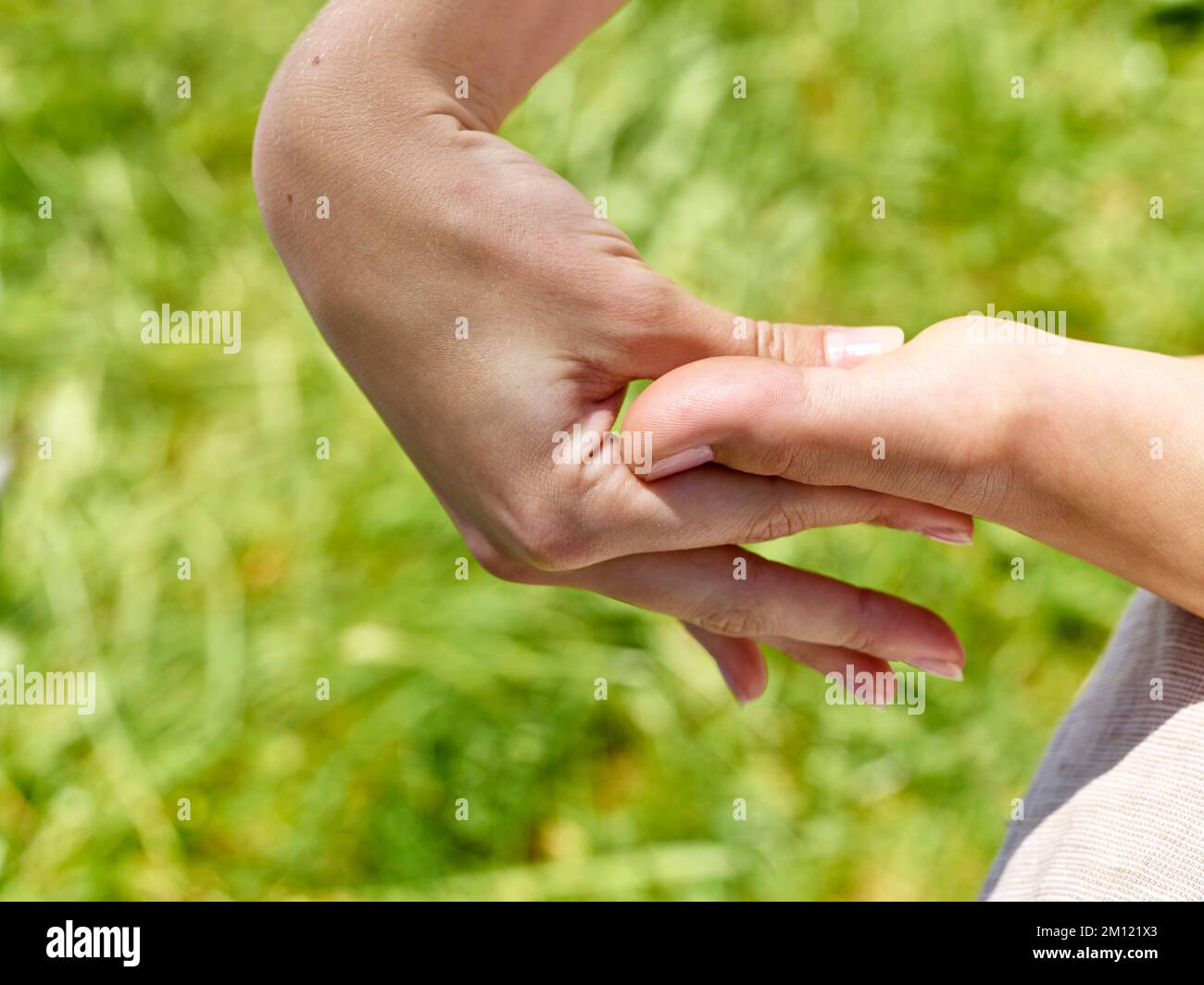 Barefoot walking - close-up with foot and hand from grip technique to ...
