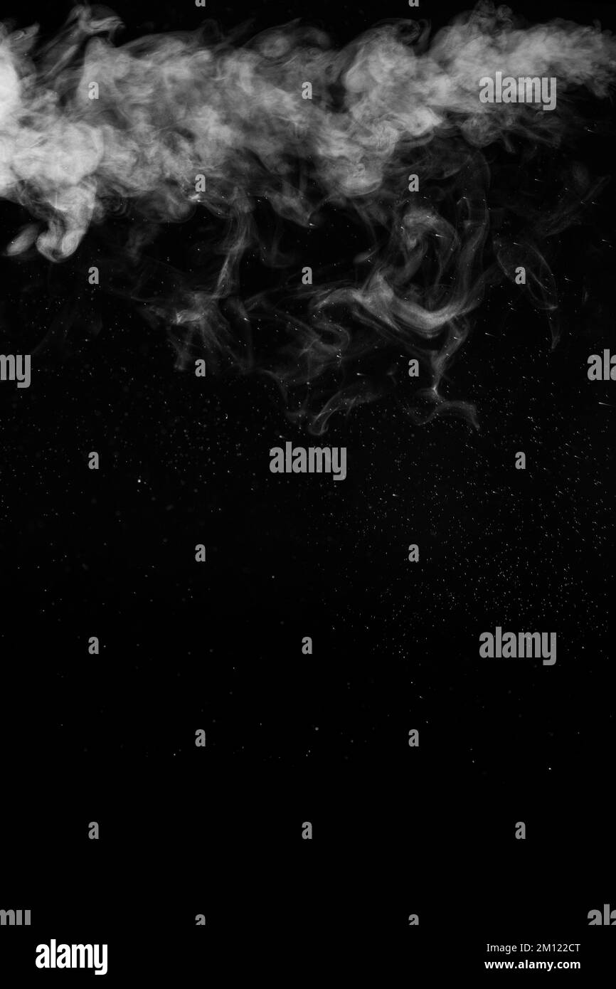 A jet of hot steam with splashes. The movement of hot steam with water ...