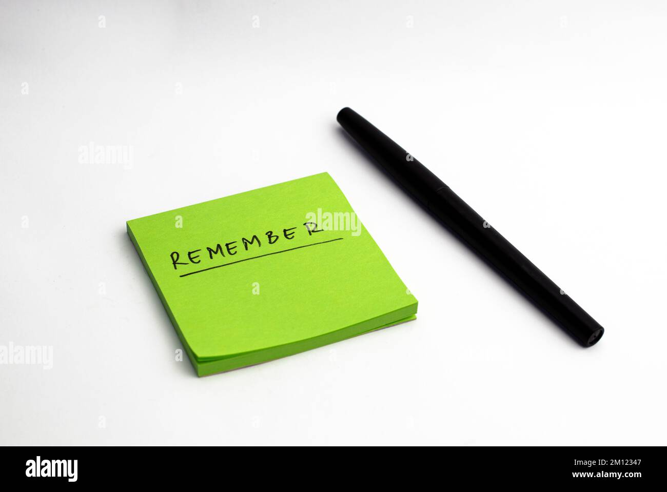 Concept: taking a note to remember something Stock Photo - Alamy