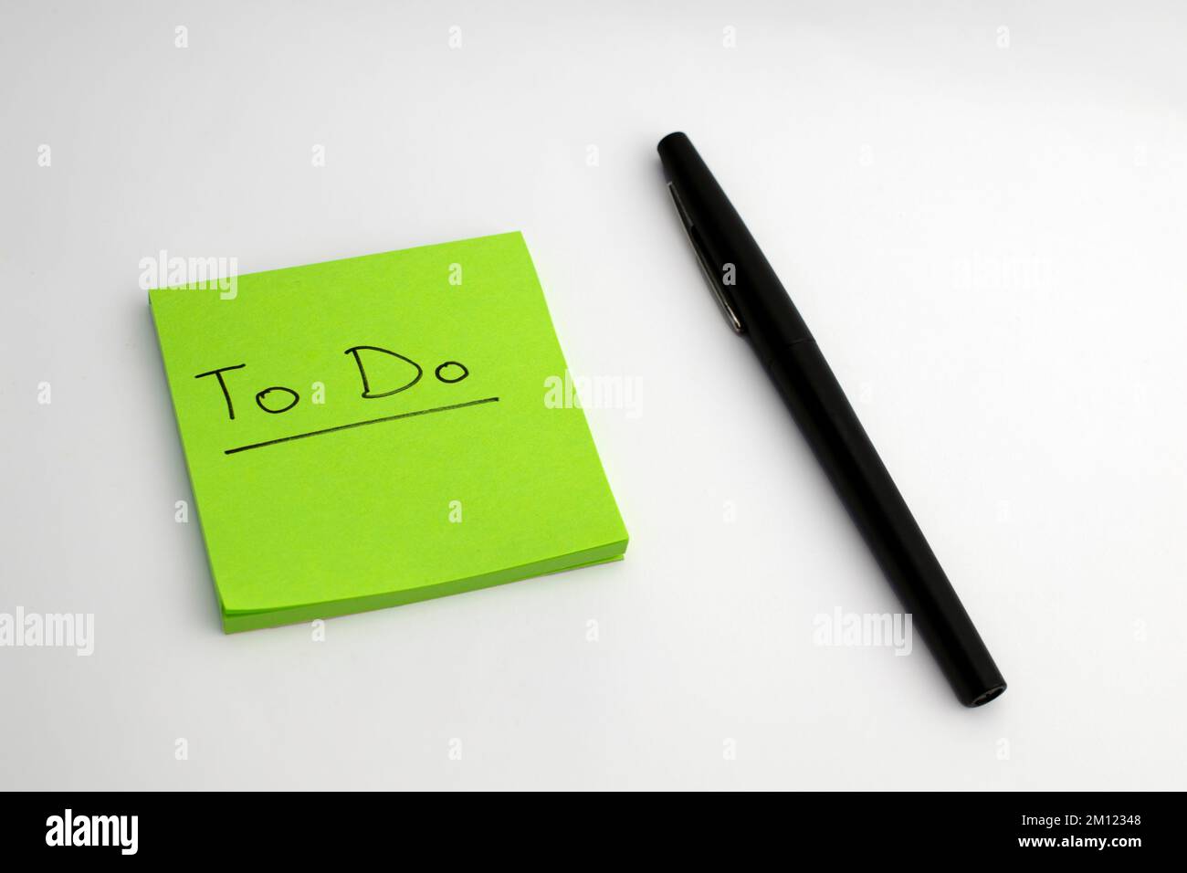 Concept: to do list, pen and paper Stock Photo - Alamy