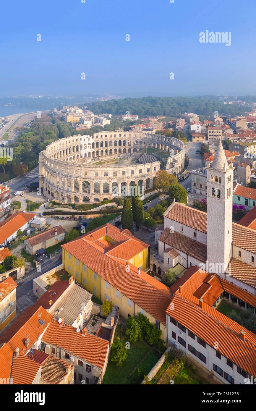 View of the St. Anthony Church and Pula Arena at sunrise. Pula, Istria ...