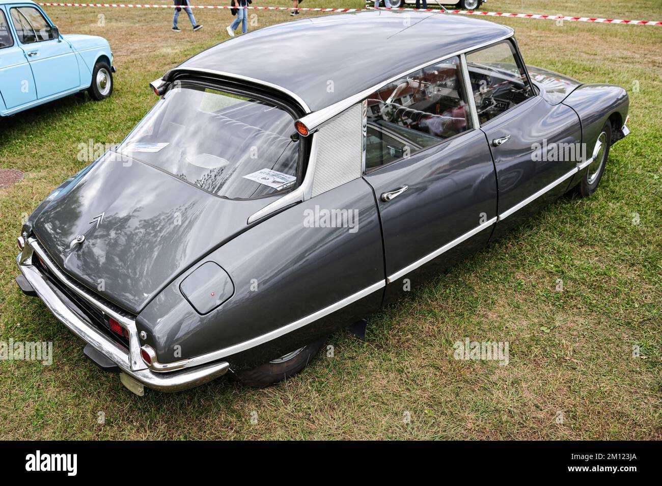 The high-angle view from behind of a black Citroen model DS parked on ...