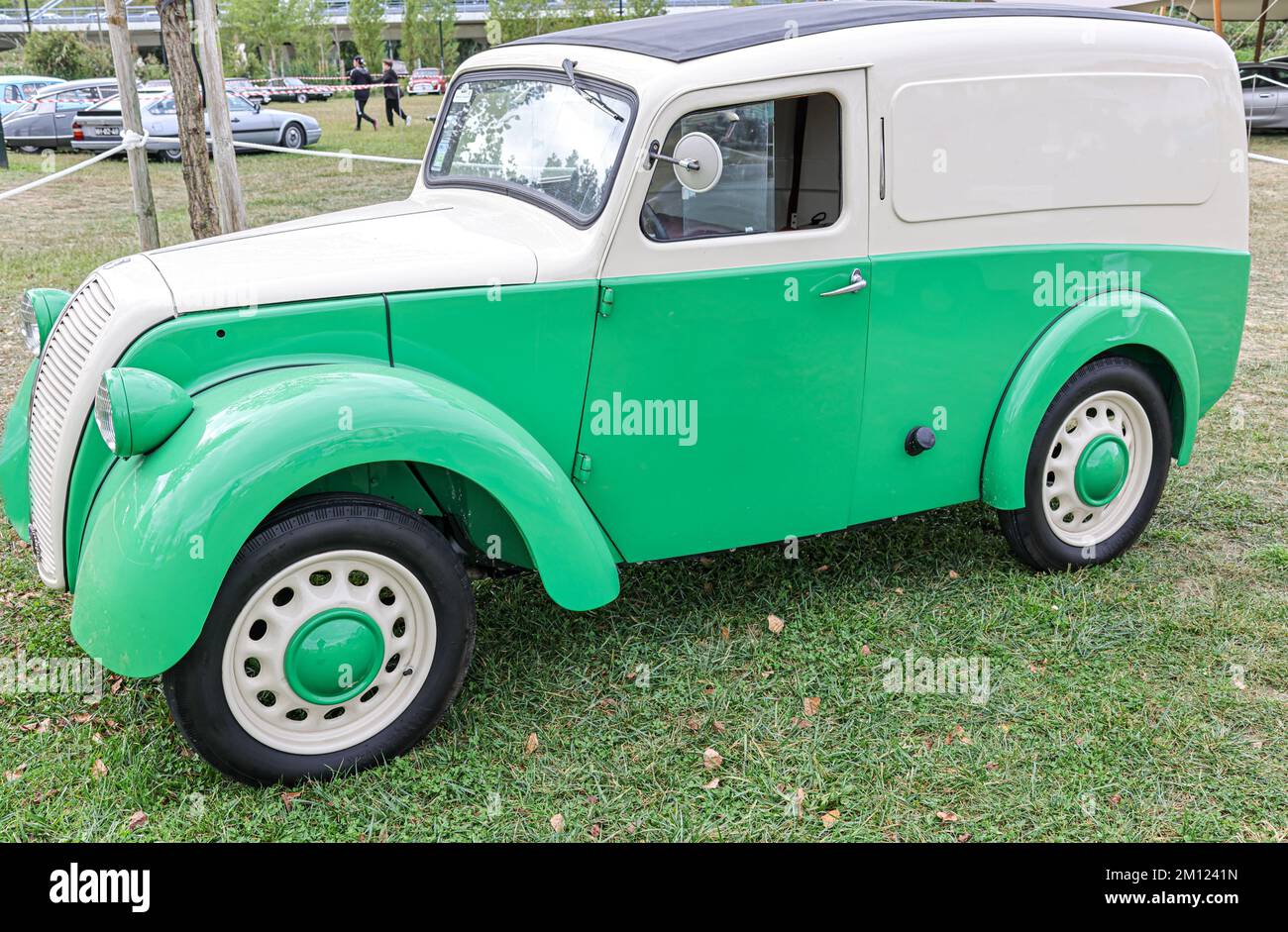 A view from the side of a green Morris van model Austin parked on the ...
