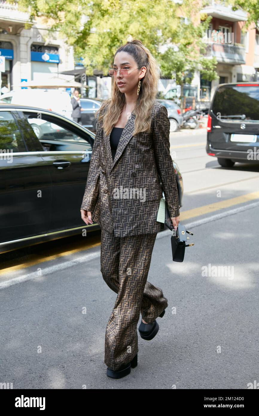 MILAN, ITALY - SEPTEMBER 21, 2022: Woman with Fendi pattern jacket and ...