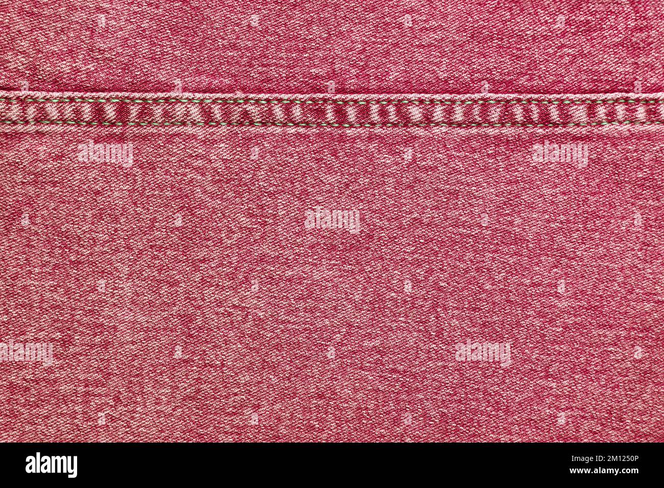Denim jeans texture background. Texture of red colored cotton fabric ...
