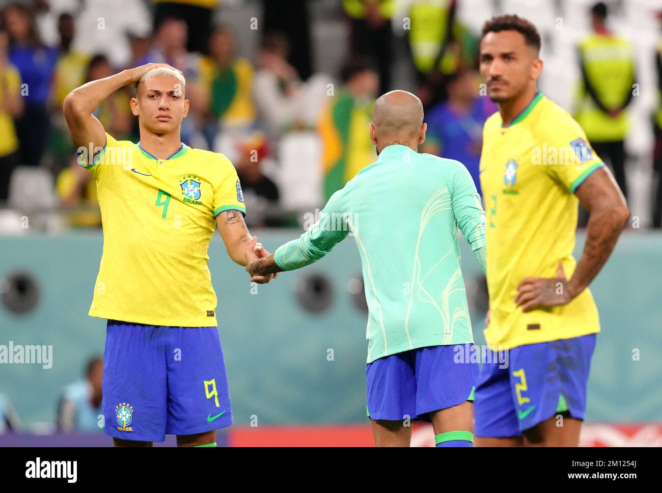 Brazil's Richarlison, Dani Alves and Danilo react to defeat in a ...