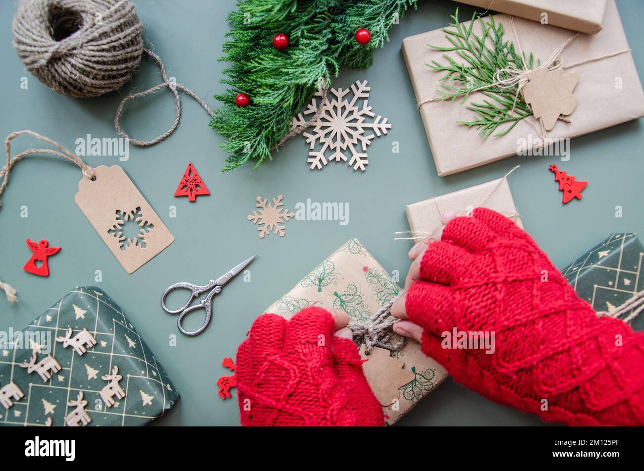 Santa Claus wrapping Christmas gift. Merry Christmas concept, Top view ...