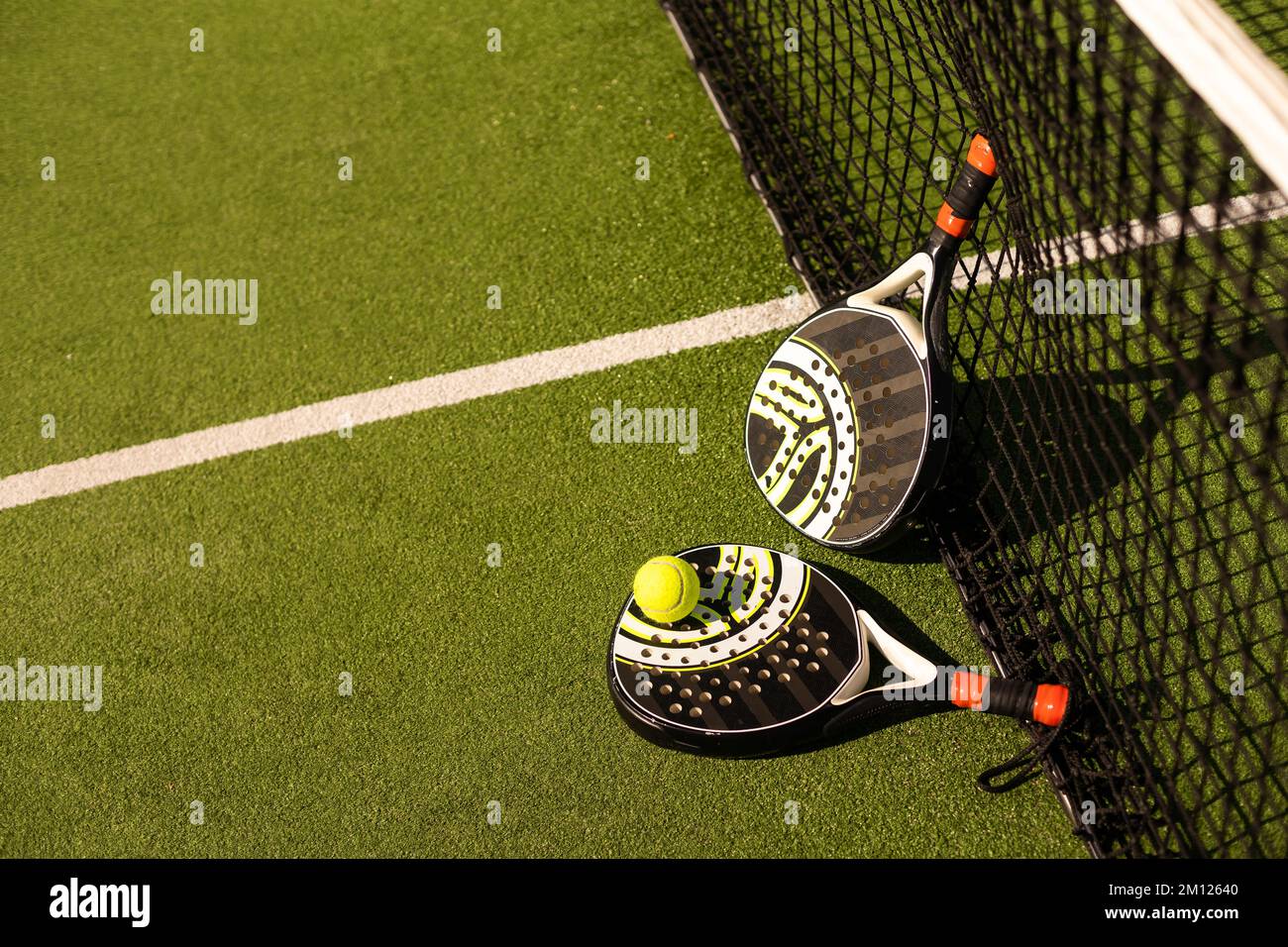Paddle tennis objects and court Stock Photo - Alamy