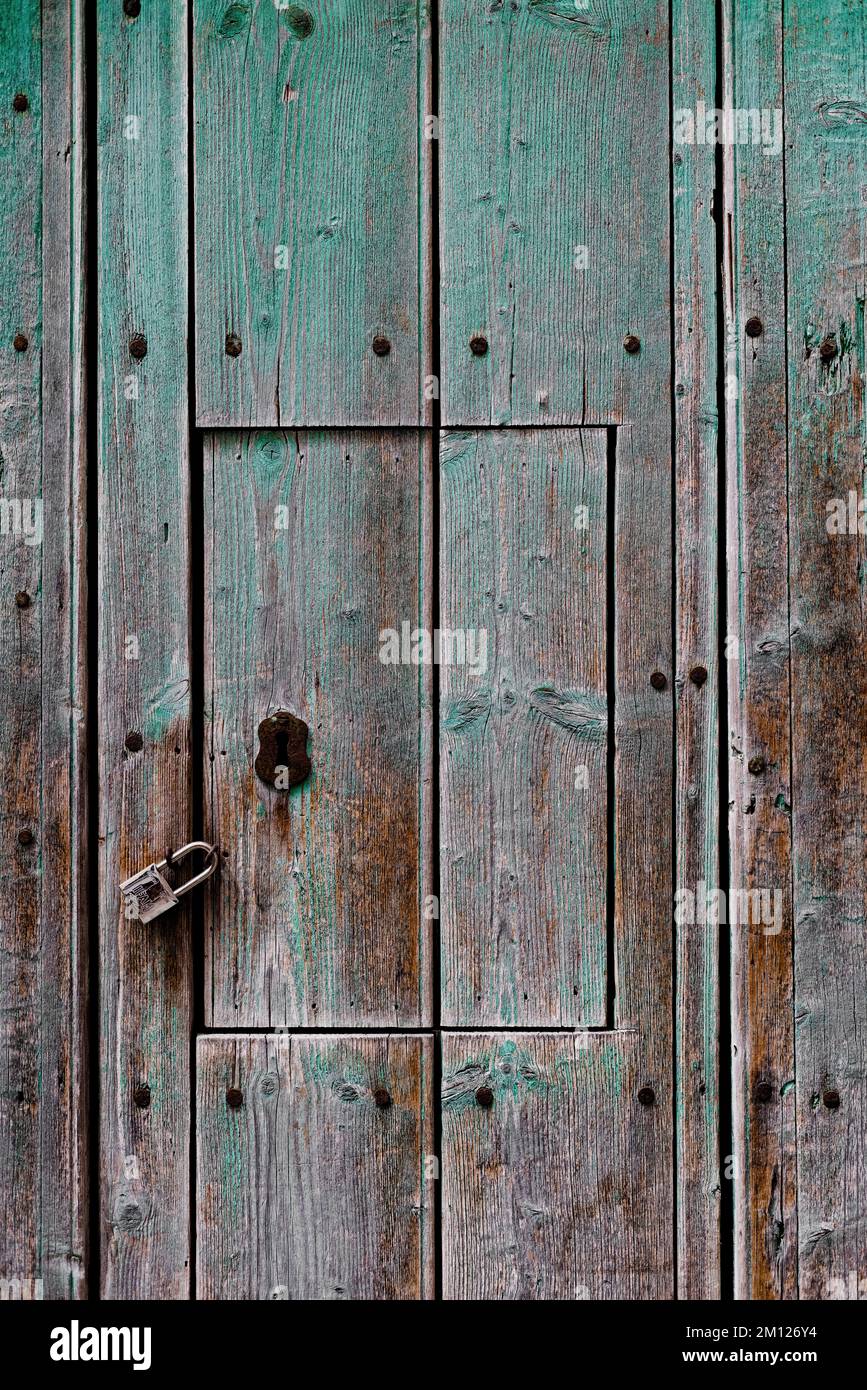 Old wooden door with a locked hatch in mallorca hi-res stock ...