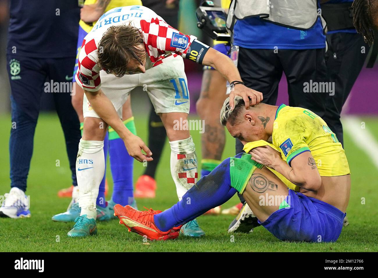 Brazil's Antony (right) is consoled by Croatia's Luka Modric after the ...