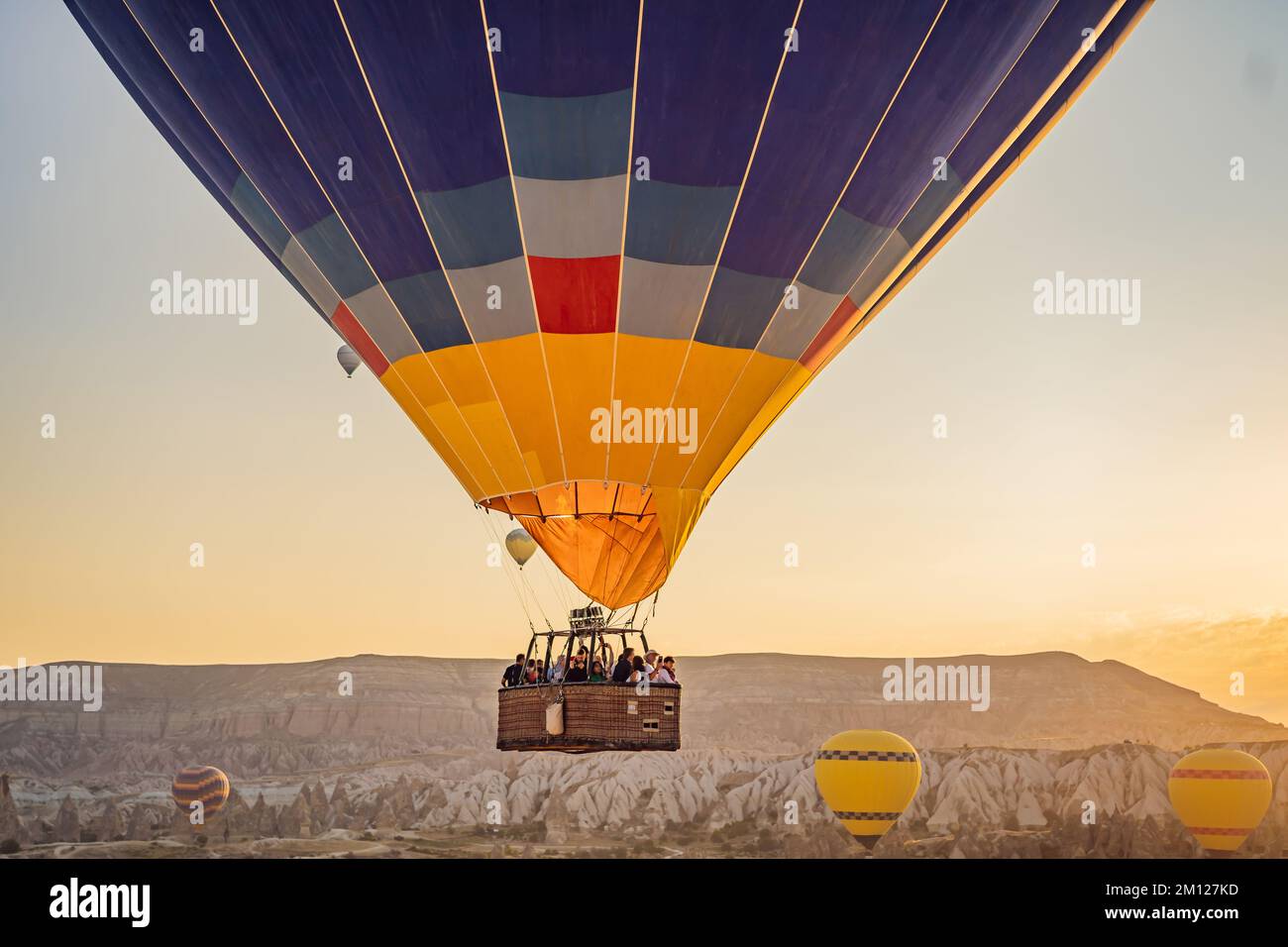 Colorful hot air balloon flying over Cappadocia, Turkey Stock Photo - Alamy