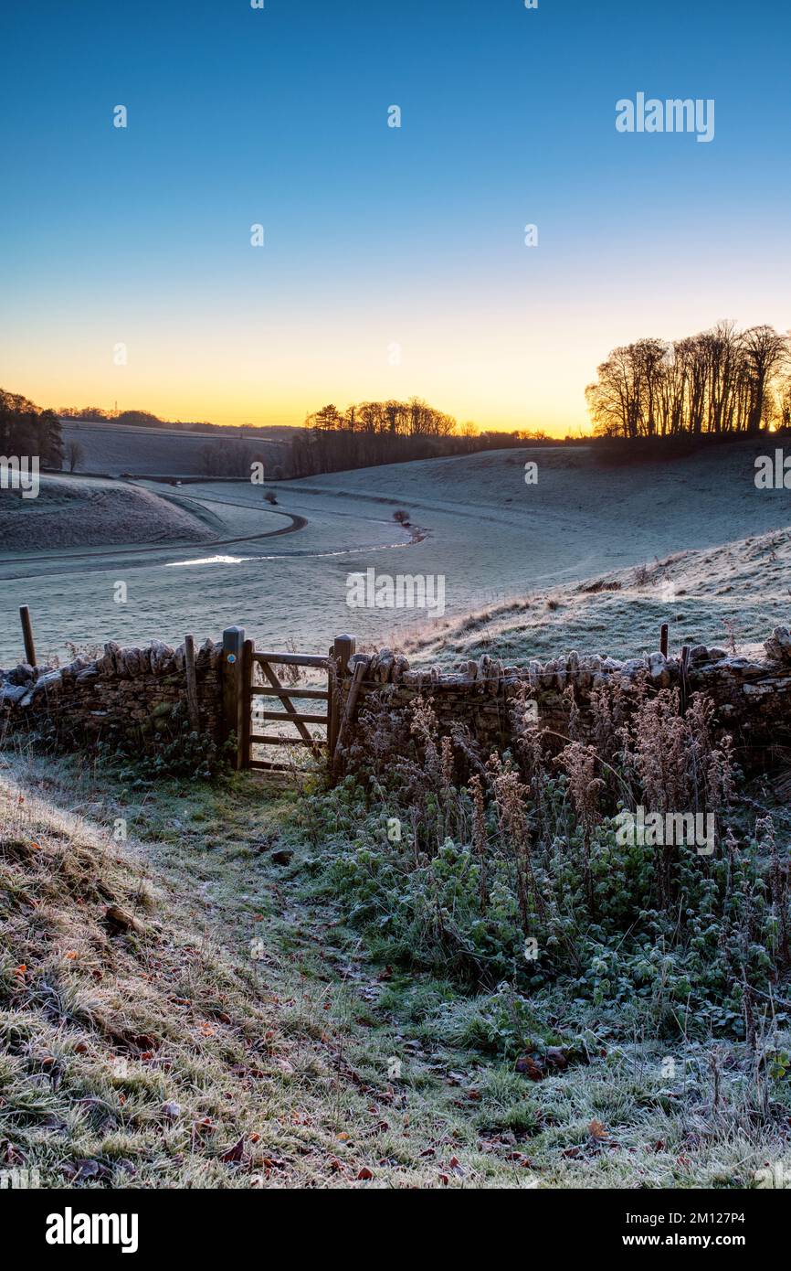 Frosty public footpath through the Hatherop estate in the cotswold ...