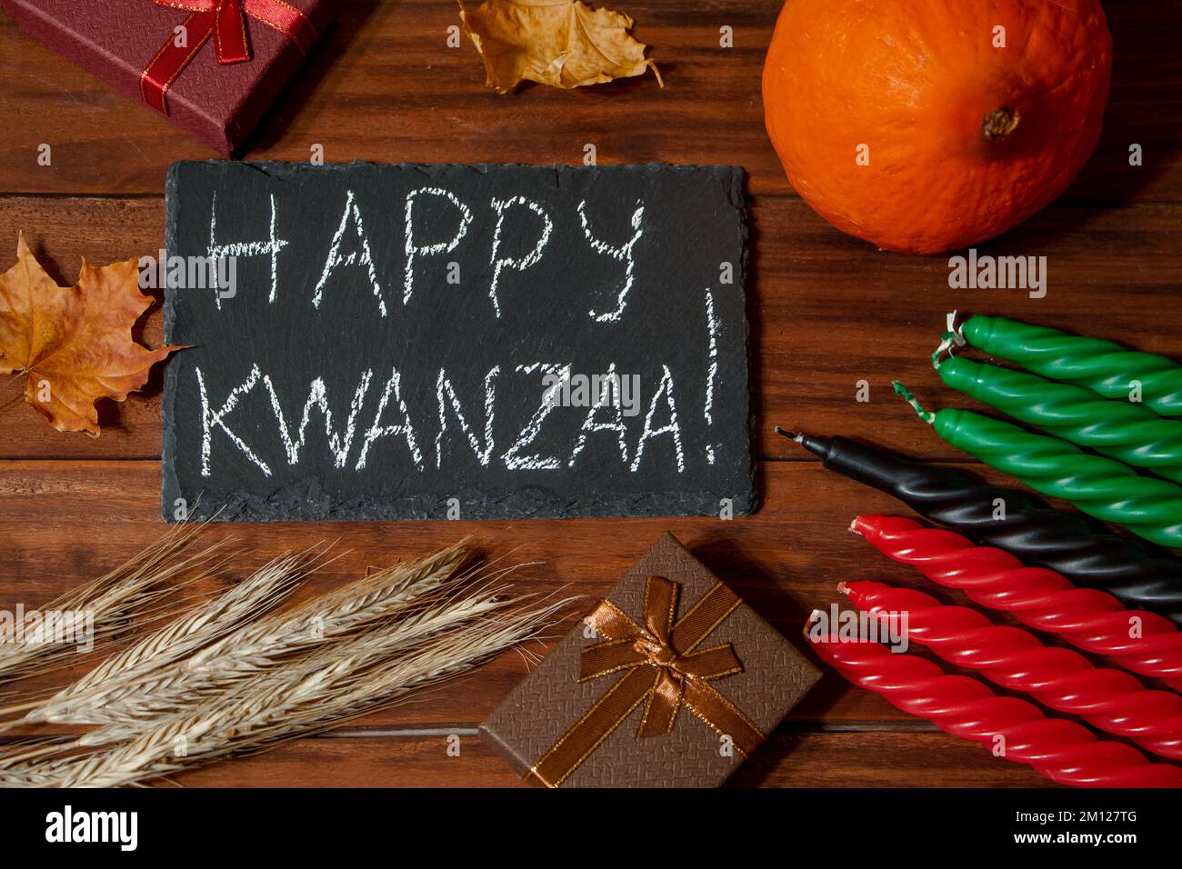Kwanzaa African American holiday. Seven candles red, black and green on ...