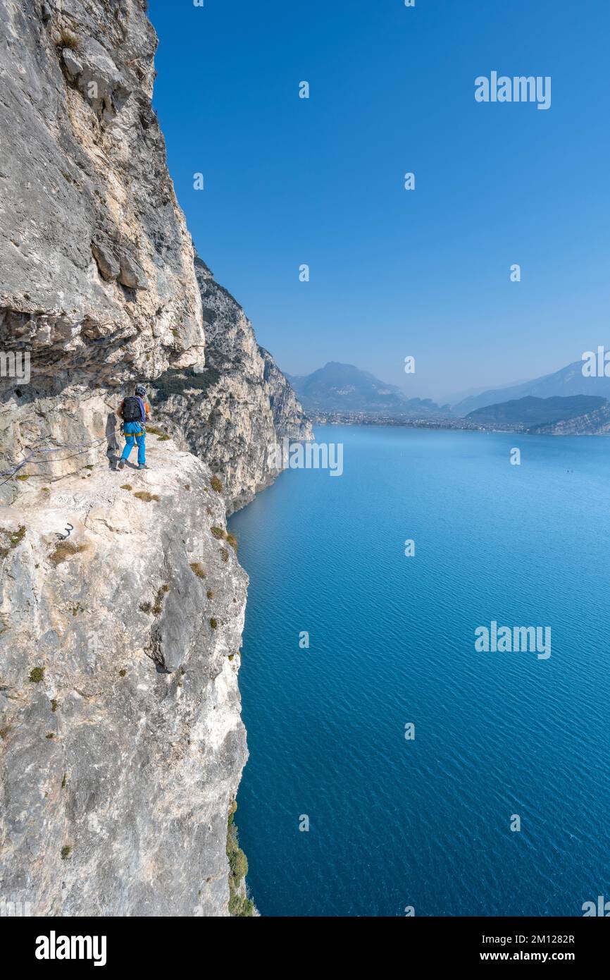 Pregasina, Riva del Garda, Trentino, Italy, Europe. A climber on the ...