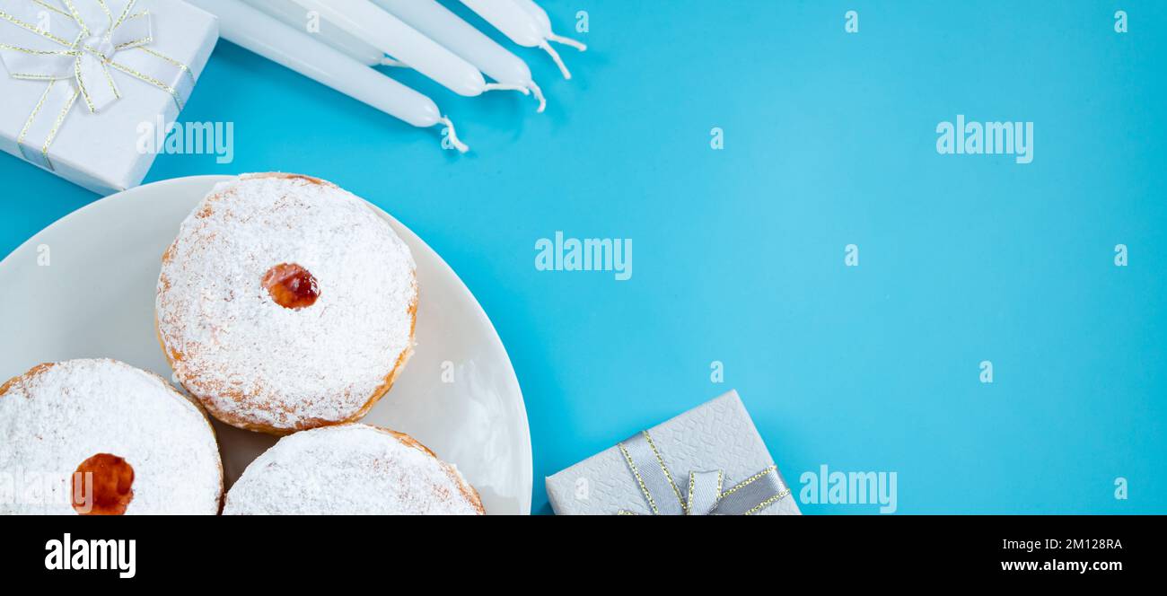 Symbols of Jewish religious holiday Hanukkah. Traditional dessert ...