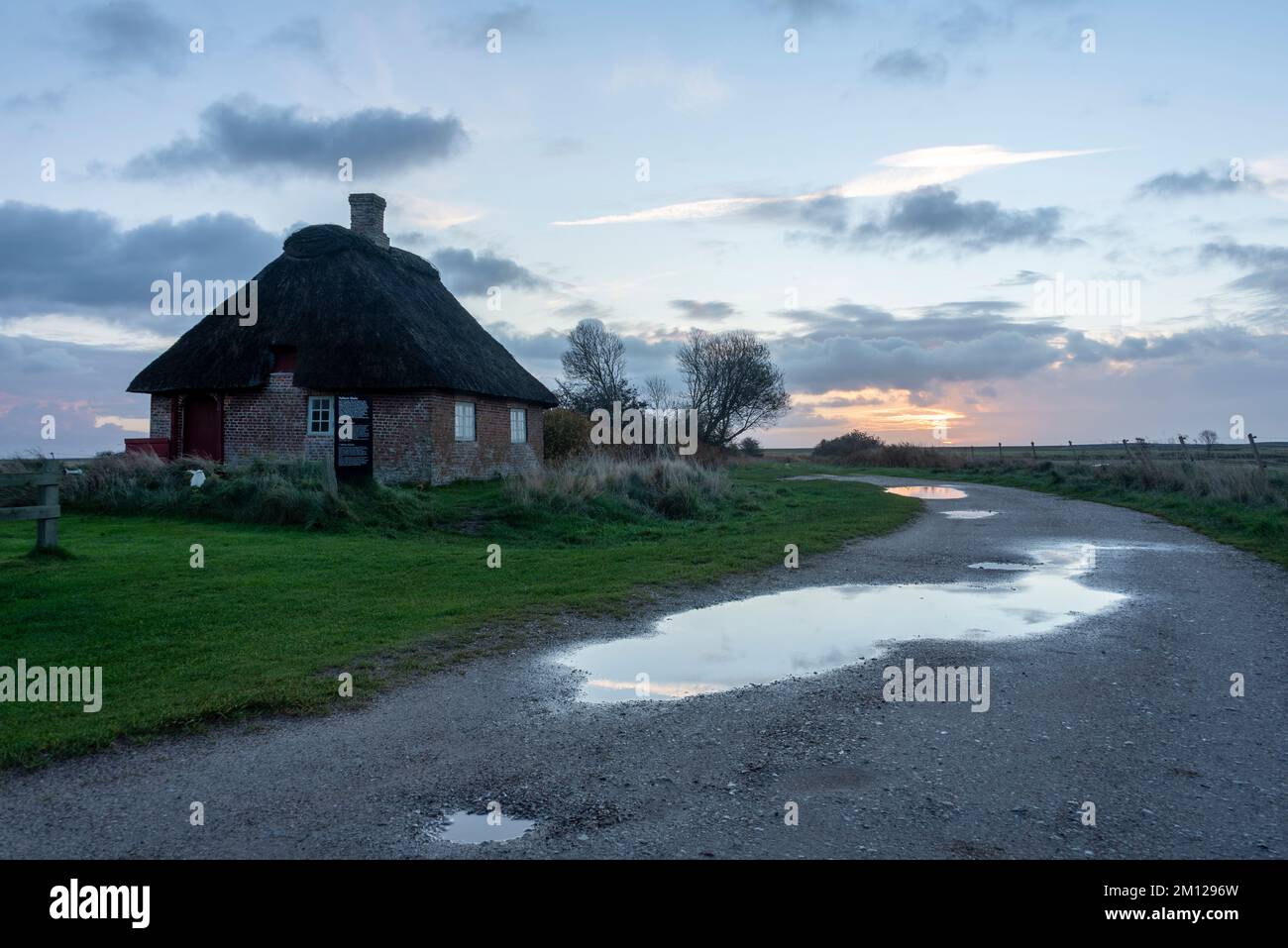 Sunrise behind Toftum Skole, oldest school in Denmark, belongs to ...
