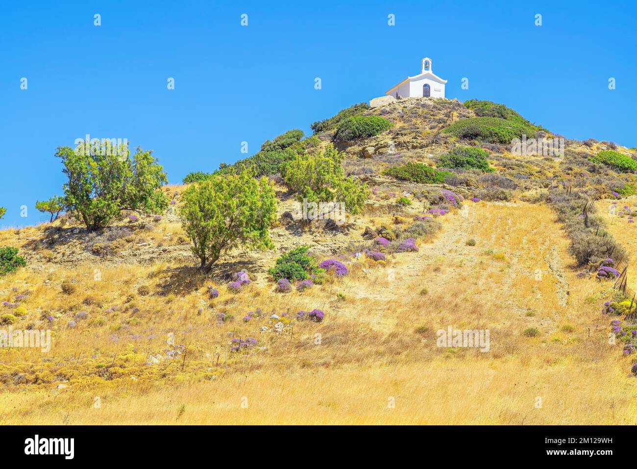 Orthodox chapel standing at the top of a hill, Triopetra, Southern ...