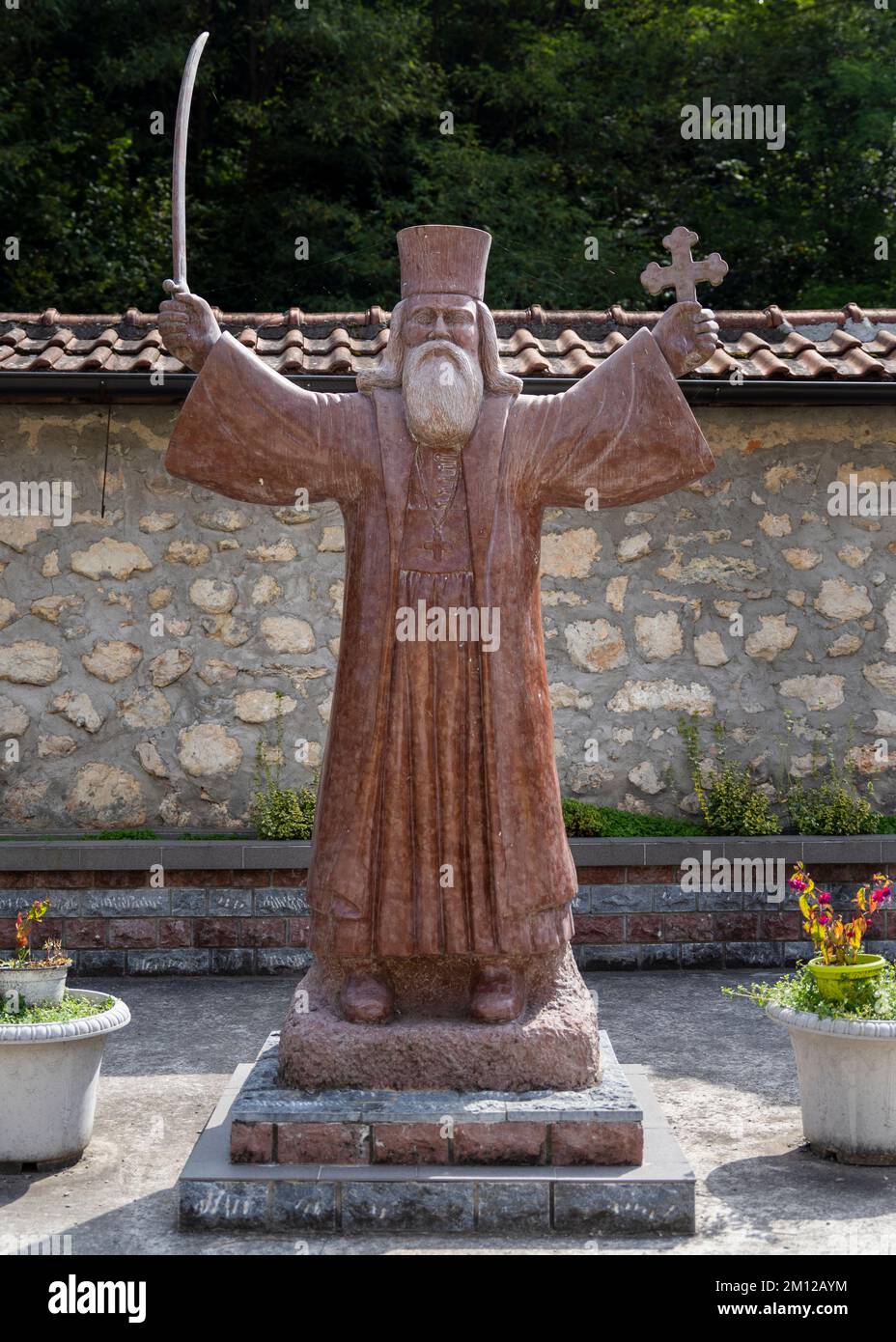 Monument of Hadzi Milentije at medieval monastery Raca at Tara mountain ...