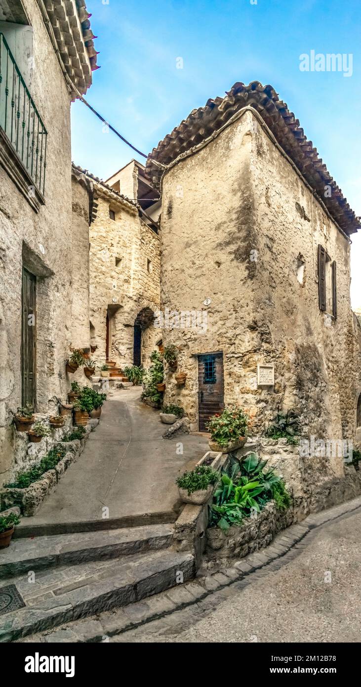 Village street in Saint Guilhem le Désert. Part of the UNESCO World ...
