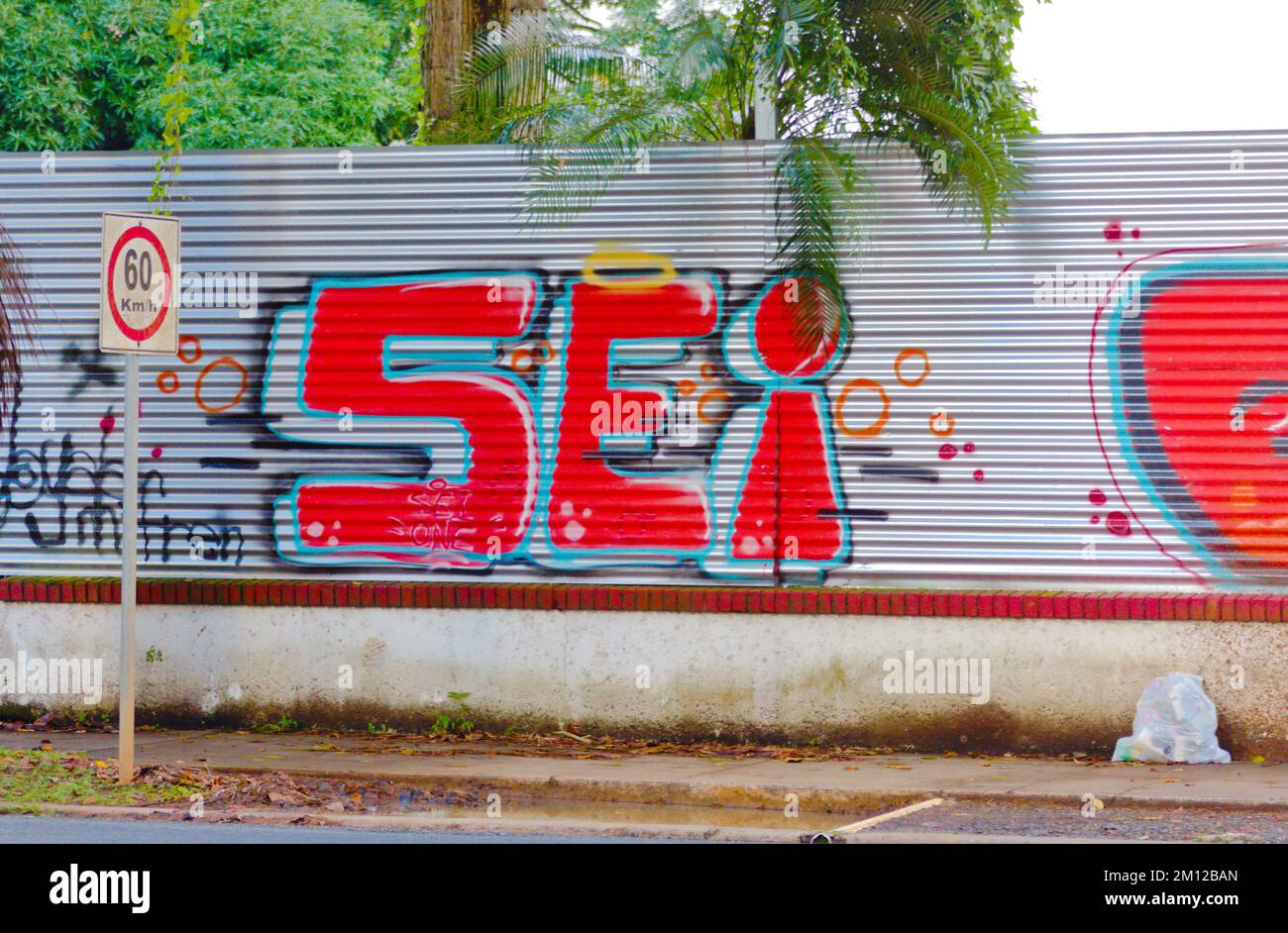 street graffiti on zinc wall Stock Photo - Alamy