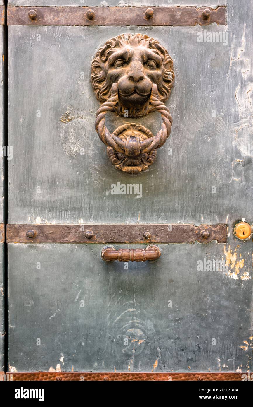 Door knocker on a house in Troia, Puglia, Italy Stock Photo - Alamy