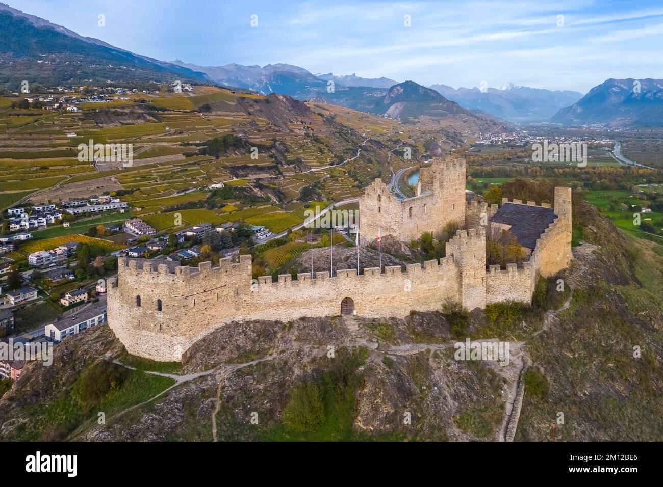 Aerial view of the Château de Tourbillon dominating the city of Sion ...